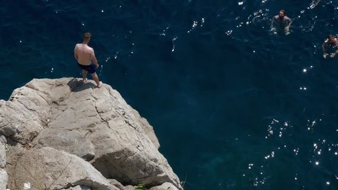 Man falling off cliff Stock Video Footage - 4K and HD Video Clips ...