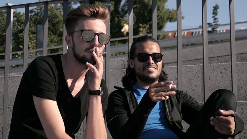 two boys friends smoking cigarettes on Stock Footage Video (100% ...