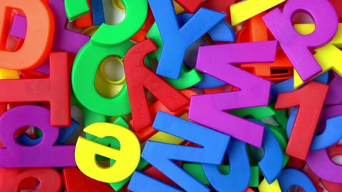 Plastic Colored Letters Numbers Alphabet Background Stock Footage Video ...