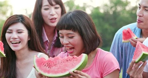 Friends Enjoy Watermelon City Park Stock Footage Video (100% Royalty ...