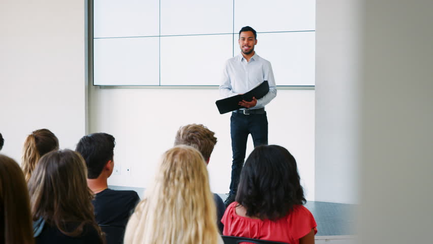 teacher giving presentation high school class Stock Footage Video (100% ...