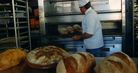 Male Chef Removing Bread Oven Kitchen Stock Footage Video (100% Royalty ...