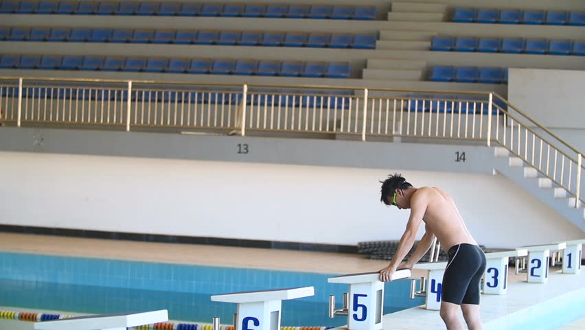 swimmer on starting block ready start Stock Footage Video (100% Royalty ...