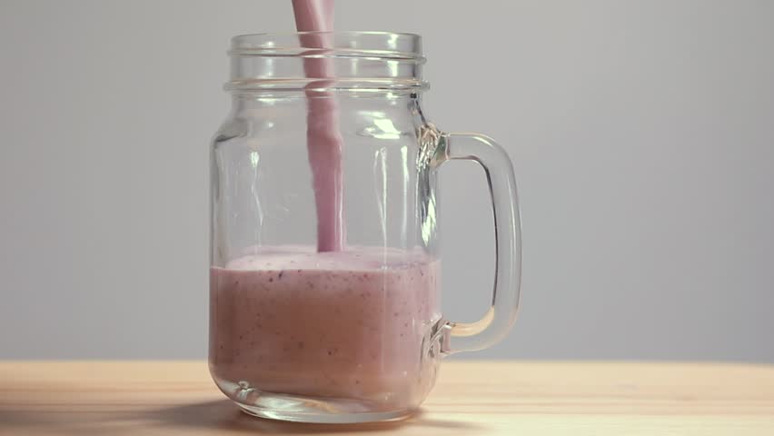 berry smoothie part 01 pouring into Stock Footage Video (100% Royalty ...