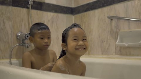 Brother sister bathtub Stock Video Footage - 4K and HD Video Clips ...