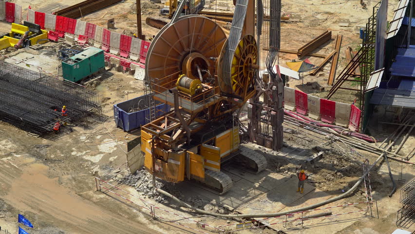 deep excavator digging holes foundation skyscraper Stock Footage Video ...