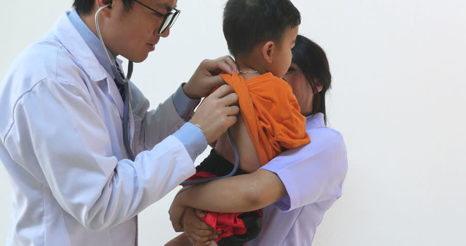 male doctor examining little boy Stock Footage Video (100% Royalty-free ...