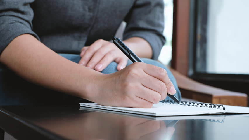 A Womans Hand Writing Down Stock Footage Video (100% Royalty-free ...