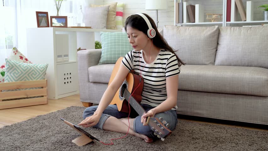 Asian Female Student Tap Her Wooden Stock Footage Video (100% Royalty ...
