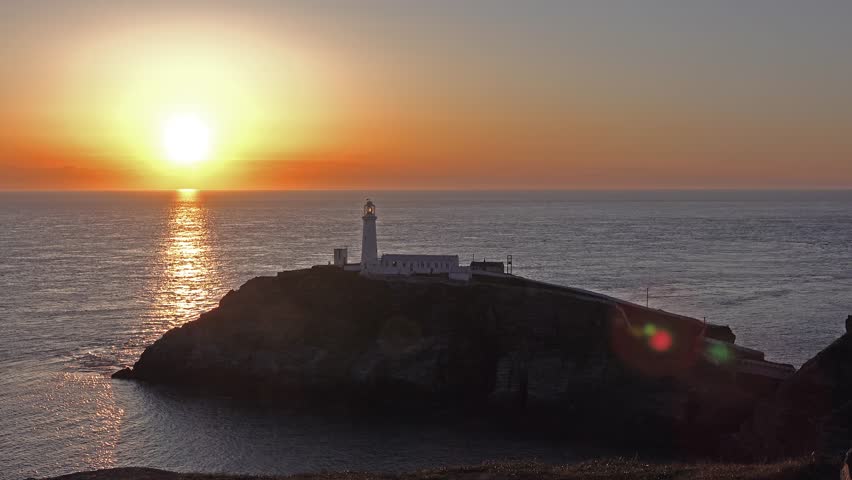 sunset lens flare south stack lighthouse Stock Footage Video (100% ...