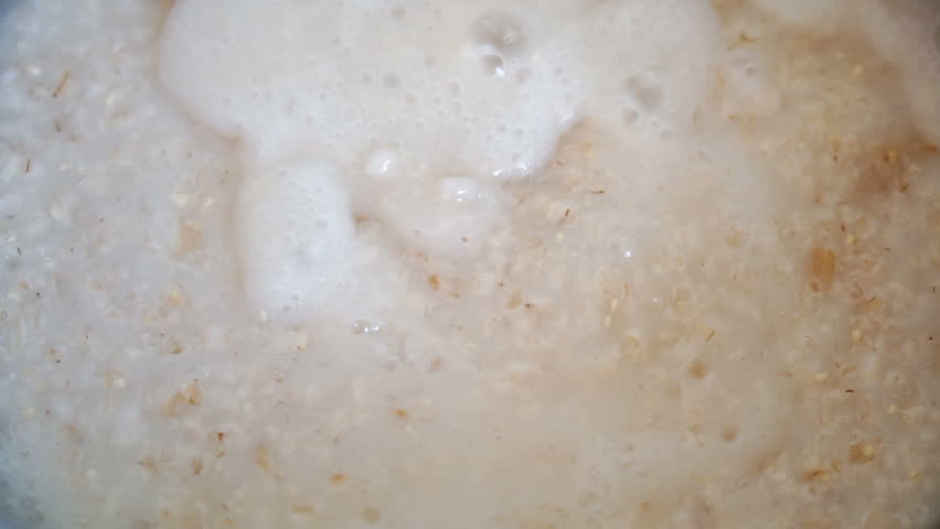 Oatmeal Porridge Boiling and Bubbling Stock Footage Video (100% Royalty ...