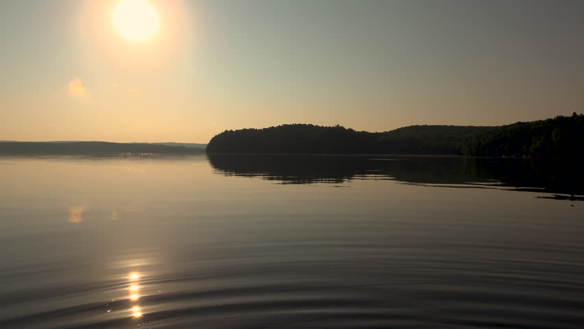 sun rising water surface ripples over Stock Footage Video (100% Royalty ...