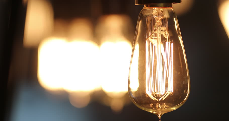 light bulb being turned on turning Stock Footage Video (100% Royalty ...