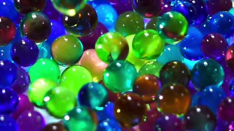 colorful polymer ball falling slow motion Stock Footage Video (100% ...