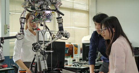 Team Robotics Engineer Works Robot Assembling Stock Footage Video (100% ...