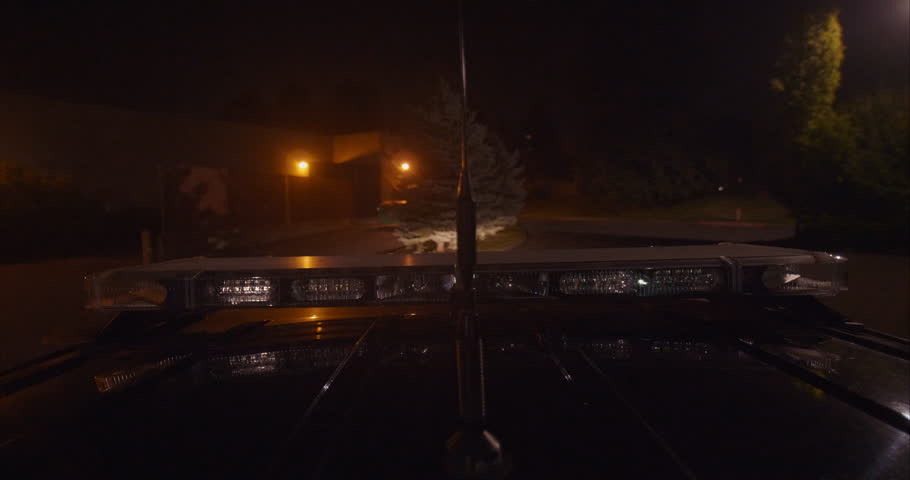 police car patrolling behind building night: วิดีโอสต็อก (ปลอดค่า ...