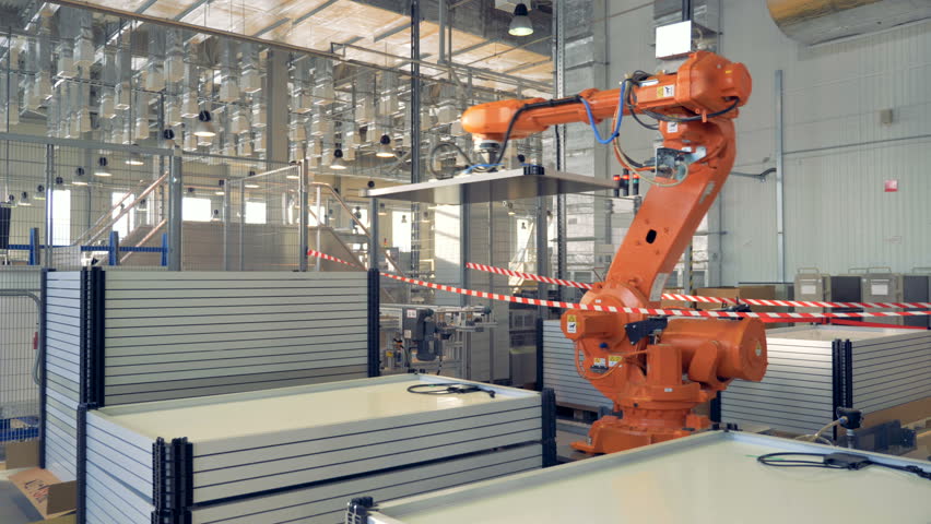 automated robotic arms assembling innovative product Stock Footage ...