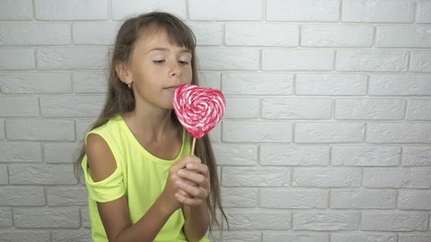 Child Candy Little Girl Big Candy Stock Footage Video (100% Royalty ...