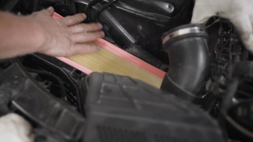 Man is Installing Air Filter Stock Footage Video (100% Royalty-free ...