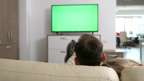 Man Woman Cozy On Couch Watch Stock Footage Video (100% Royalty-free ...