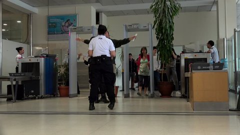 Security check point with metal detector Stock Video Footage - 4K and ...