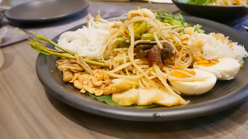 Papaya Salad or Som-tom is Stock Footage Video (100% Royalty-free ...