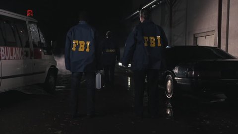 Fbi Agents Crime Scene Rear View Stock Footage Video (100% Royalty-free) 1016754037 | Shutterstock