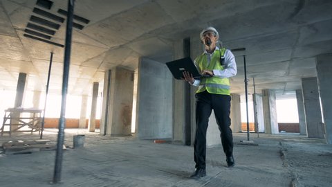 Building Progress Construction Male Engineer Walking Stock Footage ...