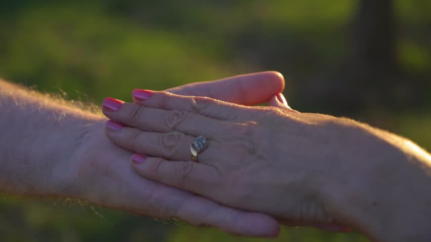 hands old man touching woman's park Stock Footage Video (100% Royalty ...