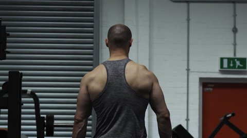 Strong Bodybuilder Resting After Intense Exercise Stock Footage Video ...