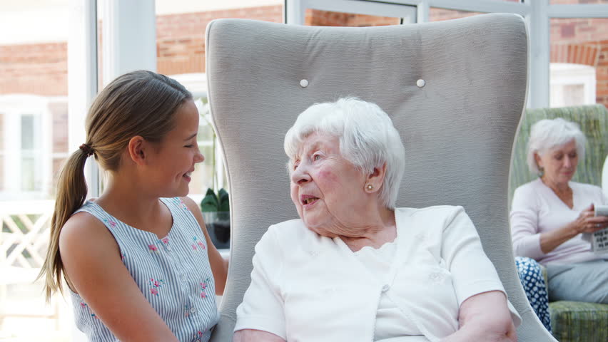 Granddaughter Sitting And Talking With Stock Footage Video 100