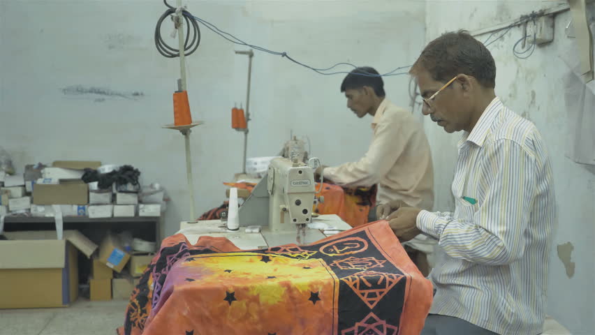 two male skilled workers using sewing Stock Footage Video (100% Royalty ...