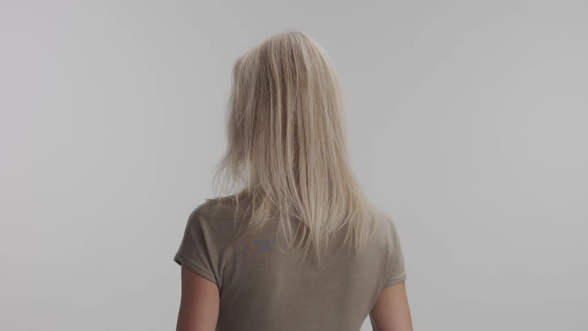 slow motion womanturnng camera hair mowes Stock Footage Video (100% ...