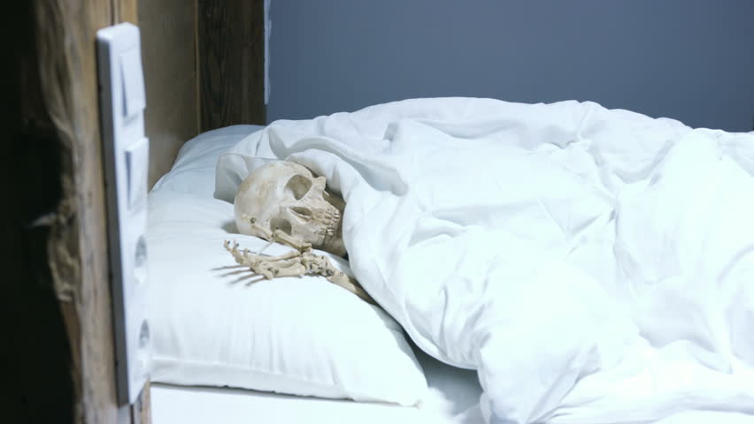 human skeleton sleeping bed under white Stock Footage Video (100% ...