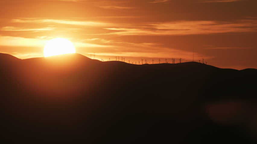 time lapse sun rising behind mountains Stock Footage Video (100% ...