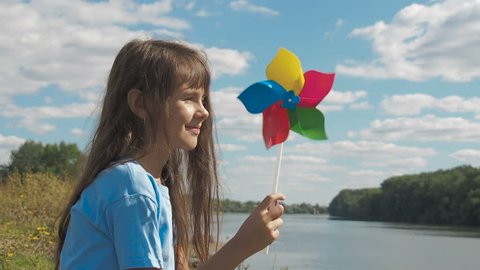 Photo Young Little Girl Blow Windmill Stock Photo 1991813795 | Shutterstock
