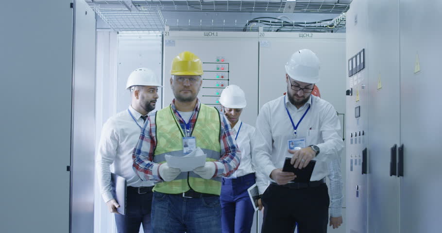 Medium Shot of Electrical Workers Stock Footage Video (100% Royalty ...