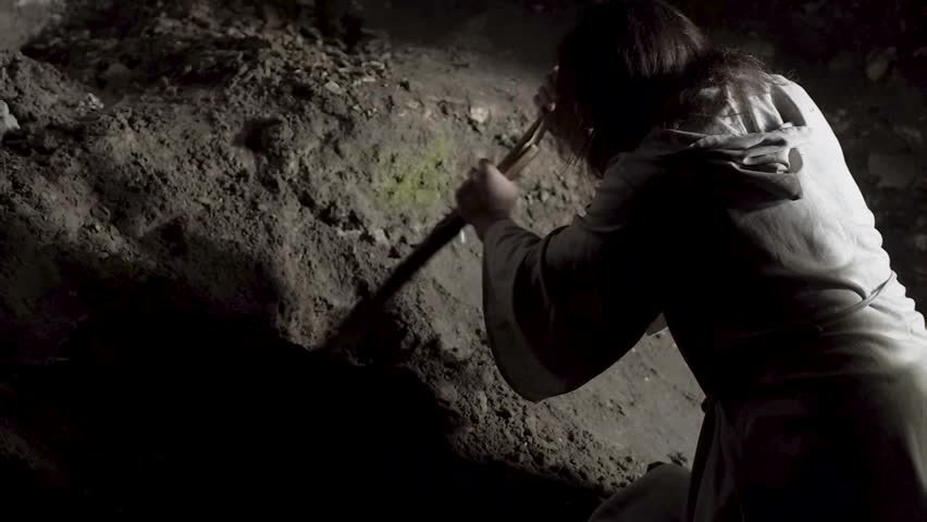 man like jesus christ digging hole Stock Footage Video (100% Royalty ...