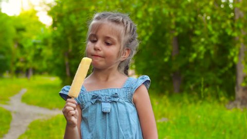 Little girl licking popsicle Stock Video Footage - 4K and HD Video ...