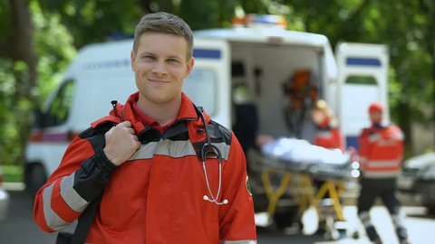 Paramedic Nodding Head Walking Ambulance Patient Stock Footage Video ...