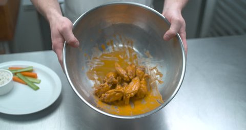 Male Chef Tossing Chicken Wings Blue Stock Footage Video (100% Royalty ...