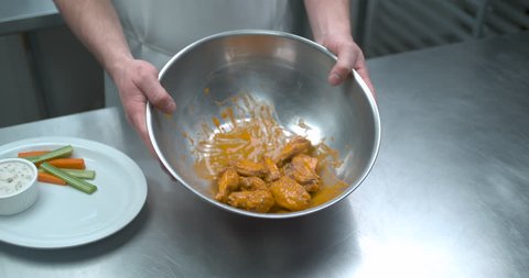 Male Chef Tossing Chicken Wings Sauce Stock Footage Video (100% Royalty ...