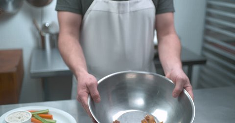Male Chef Tossing Chicken Wings Sauce Stock Footage Video (100% Royalty ...