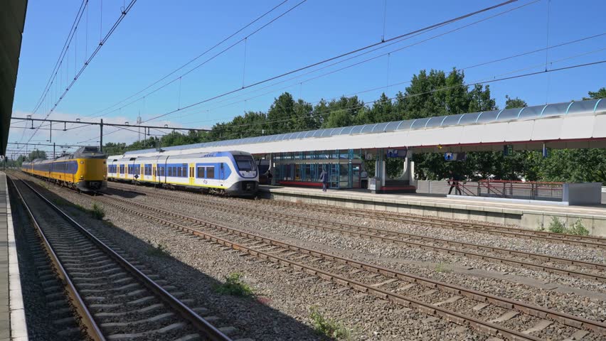 intercity train 'koploper' passing weesp station Stock Footage Video ...