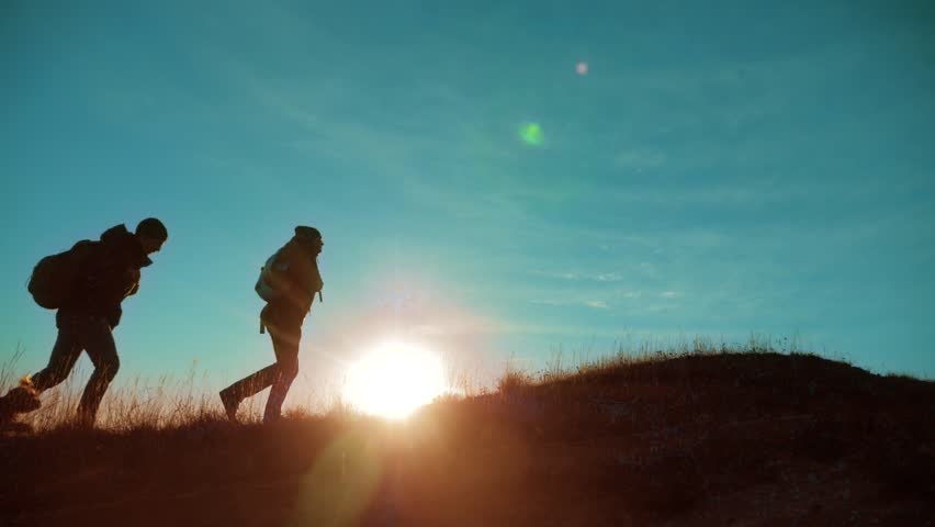 Teamwork. Two Hikers Enjoying Sunrise Stock Footage Video (100% Royalty ...