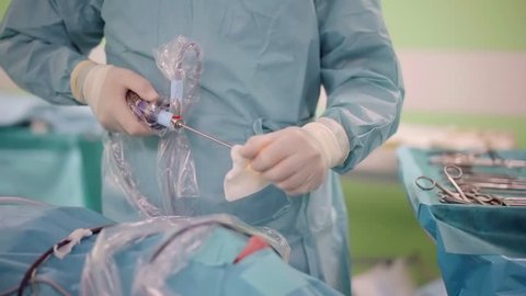 Male Surgeon Preparing Medical Instrument Endoscopic Stock Footage ...