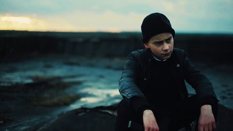 Brooding Sad Boy Gun Hand Sitting Stock Footage Video (100% Royalty ...