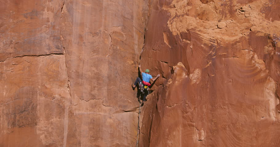 aerial view man rock climbing extreme Stock Footage Video (100% Royalty ...