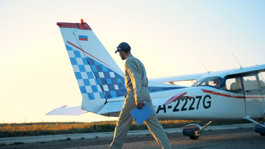 Male Pilot Checking Airplanes Wings. Stock Footage Video (100% Royalty ...