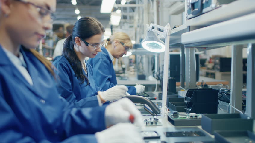 woman electronics factory worker blue work Stock Footage Video (100% ...